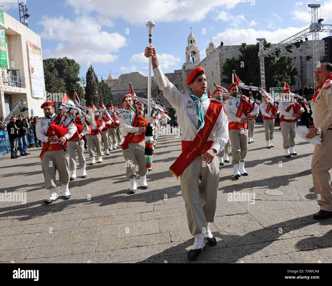 Palestinian Christian scouts march in a Christmas Eve procession in ...