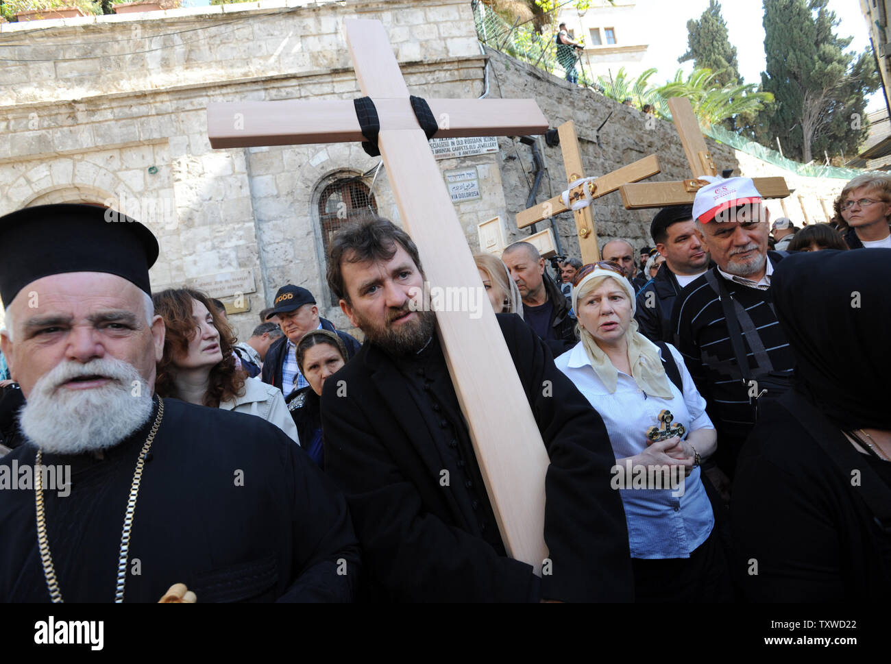 Orthodox Christian pilgrims crosses on the Via Dolorosa, "The Way of ...