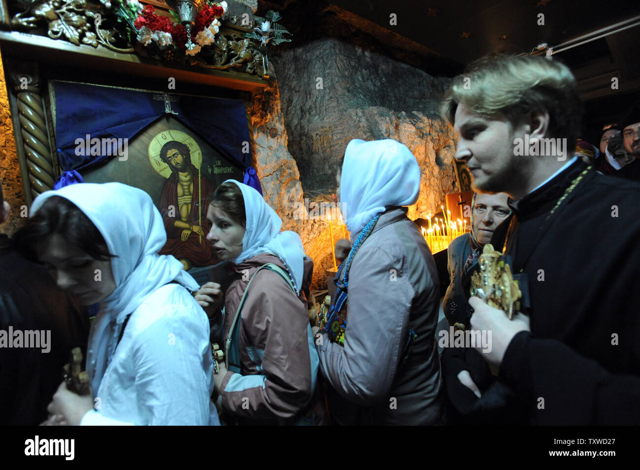 Orthodox Christians pray in a site believed to be the prison of Jesus ...