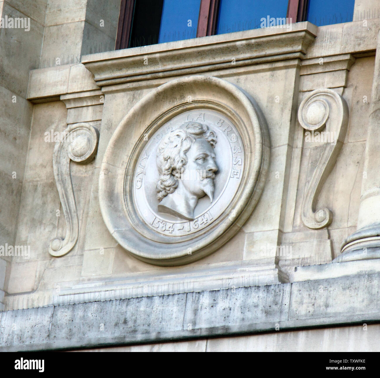 Ancient bas-reliefs on the Windows and walls of historical buildings ...