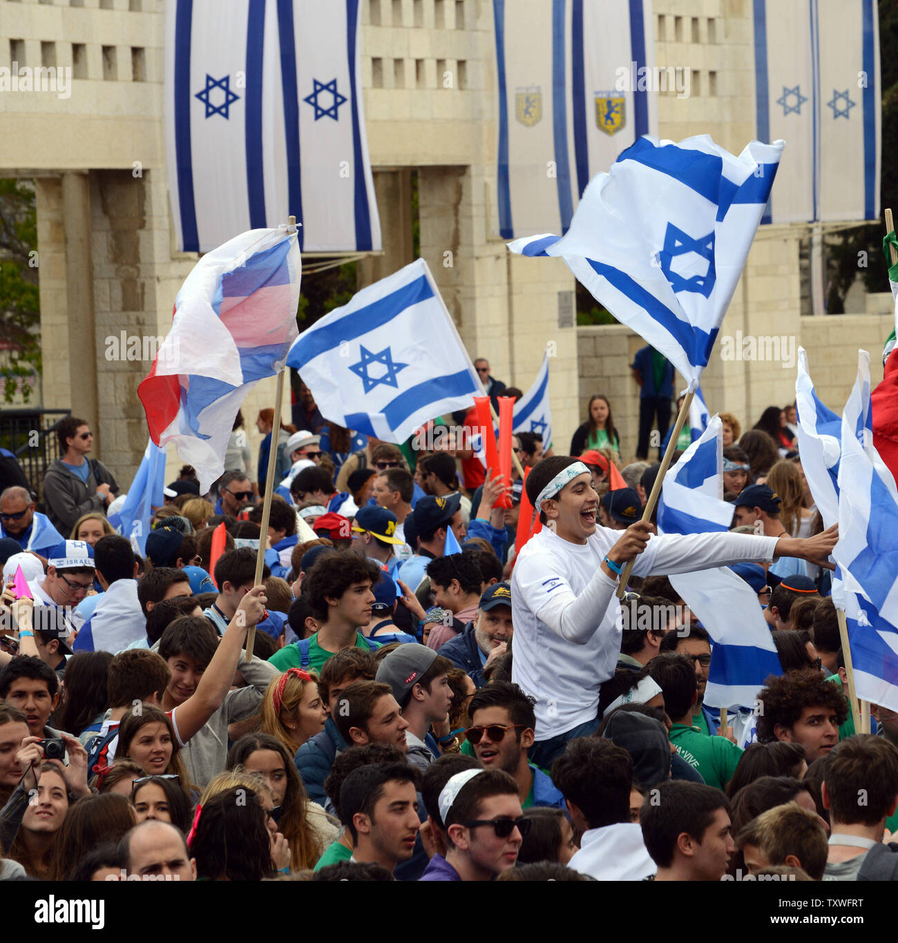 International Jewish youth wave Israeli flags at an Israel Independence ...
