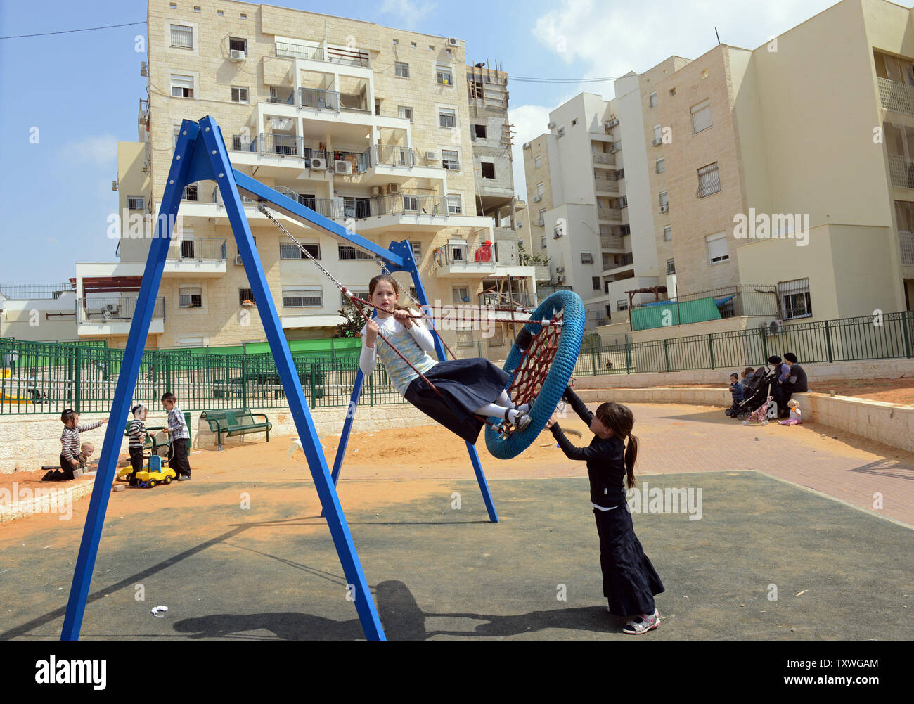 Ultra-Orthodox Jewish children play in a playground in the Jewish ...
