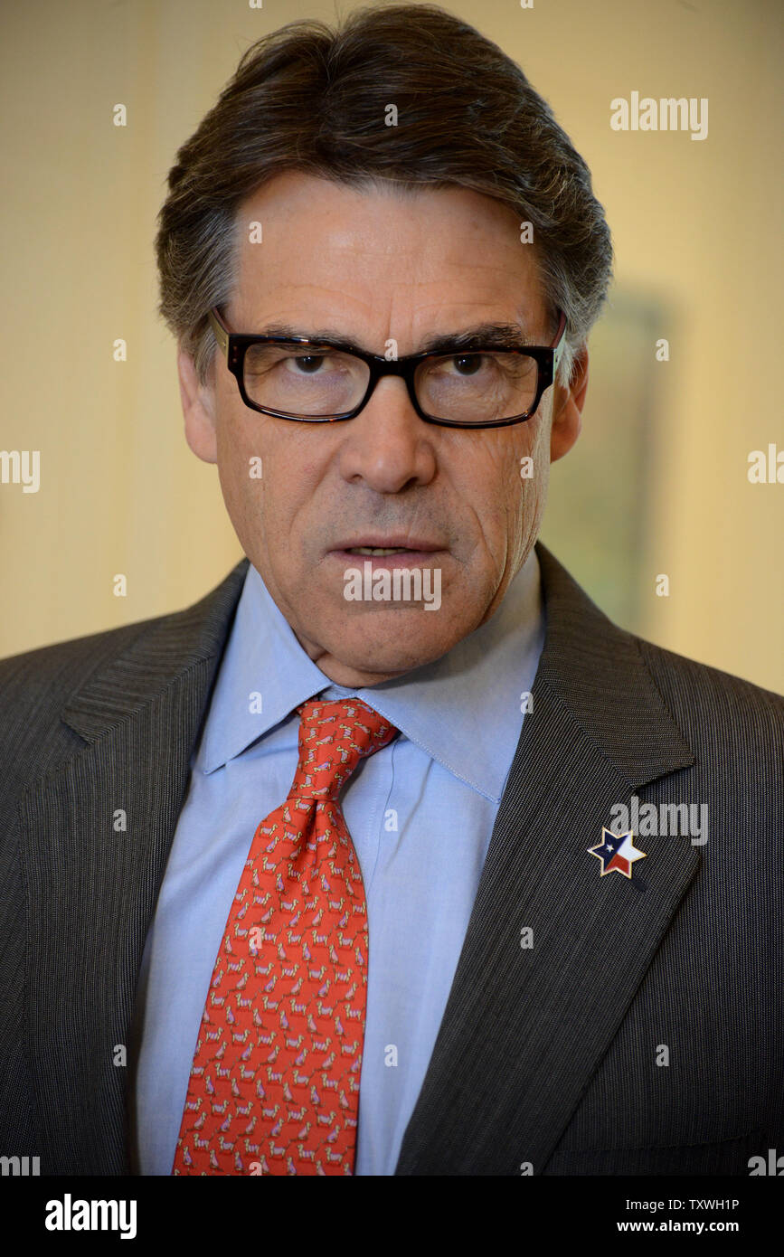 Texas Governor Rick Perry attends a ceremony at the residence of ...