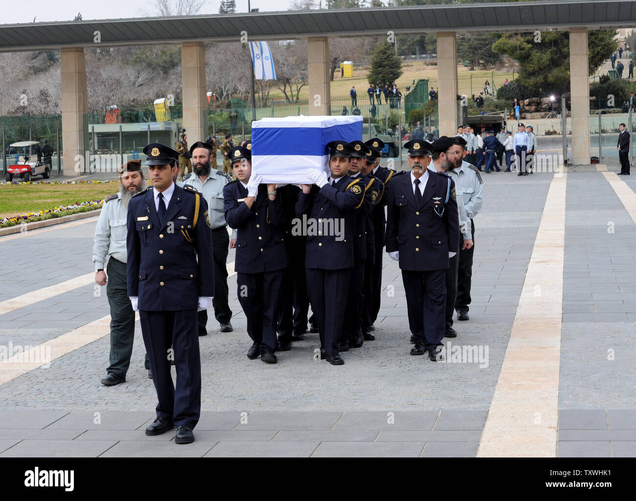 Members of the Knesset guard carry the coffin of the late former ...