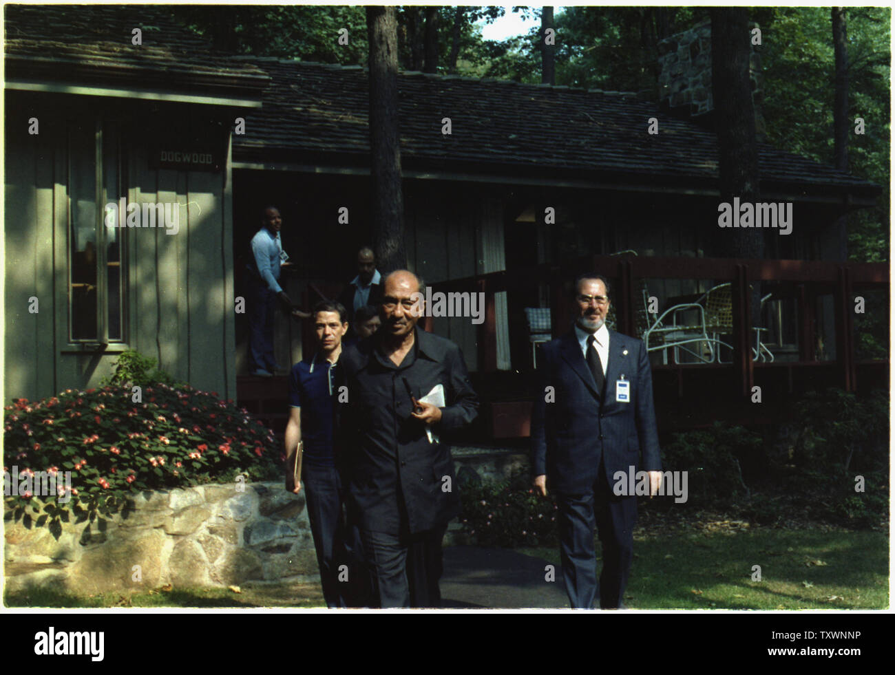 Anwar Sadat with members of the Egyptian delegation at Camp David Stock ...