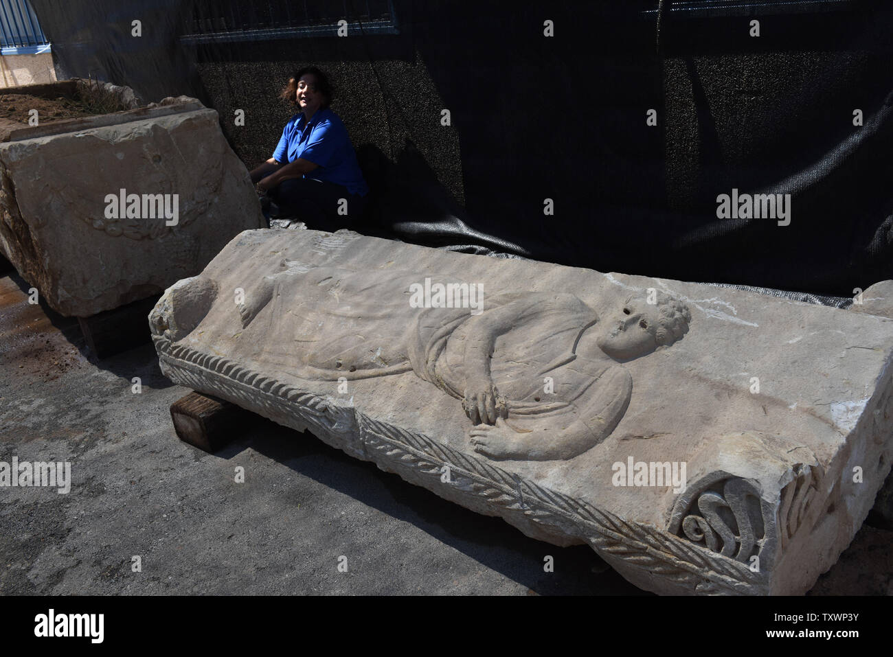 An Israeli Antiquities Authority Worker Cleans A Unique Roman Era