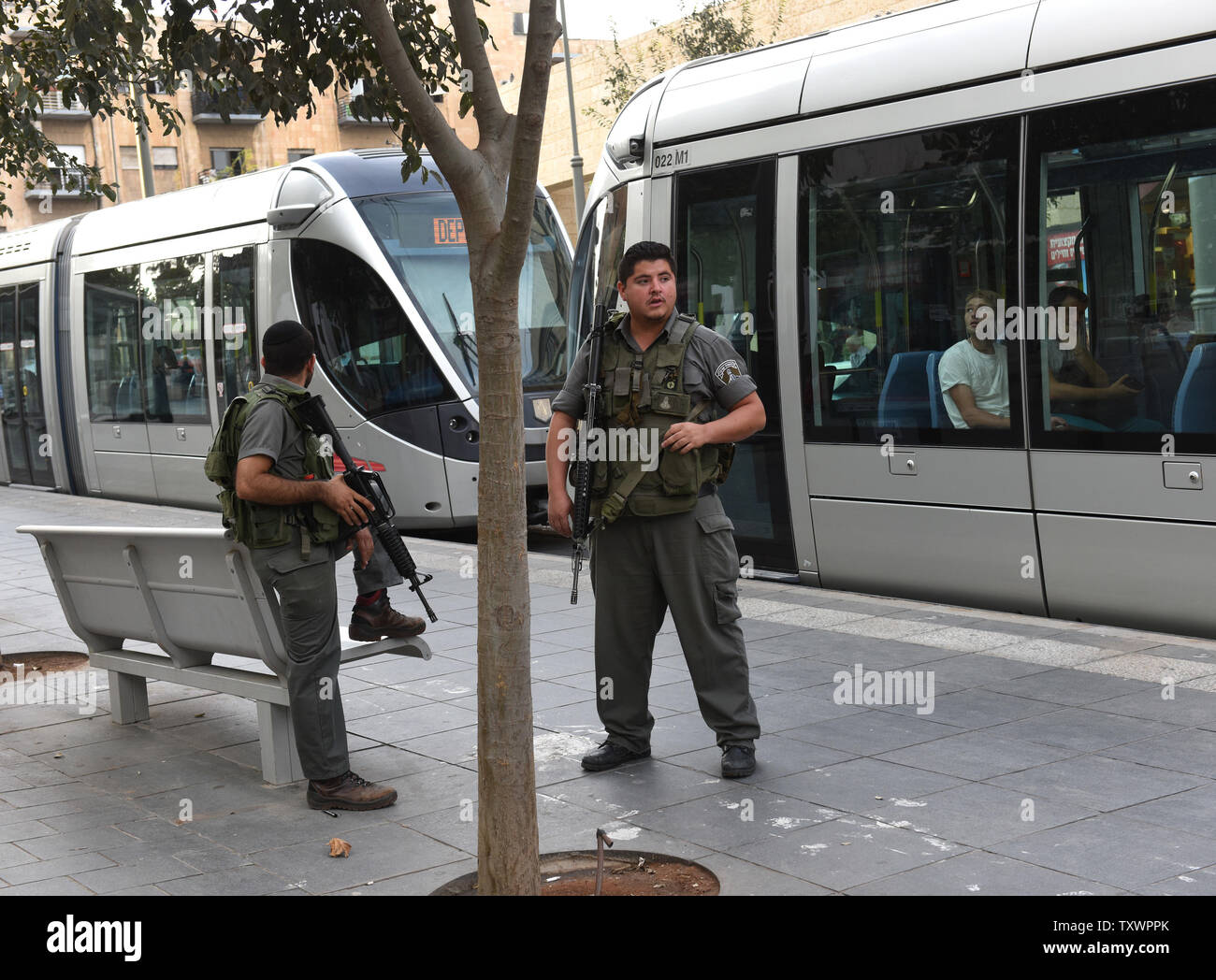 Israeli border police patrol near a light rail train station in central ...