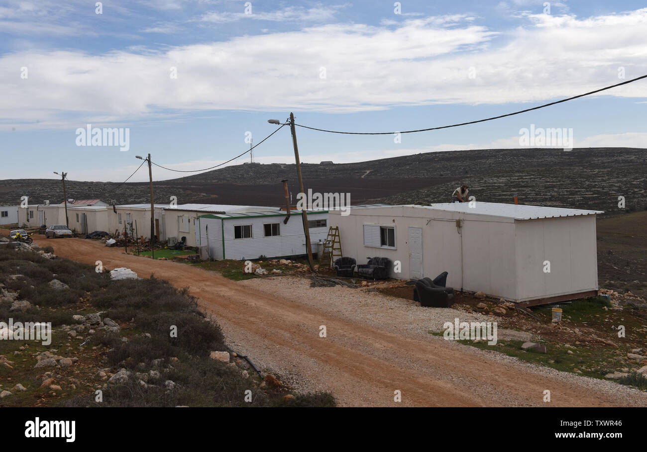 Houses set on a hill in the Israeli illegal settlement outpost Esh ...