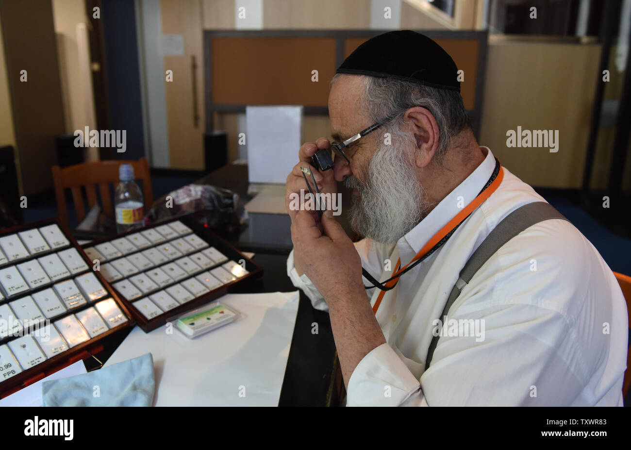 Inspects diamond hi-res stock photography and images - Alamy