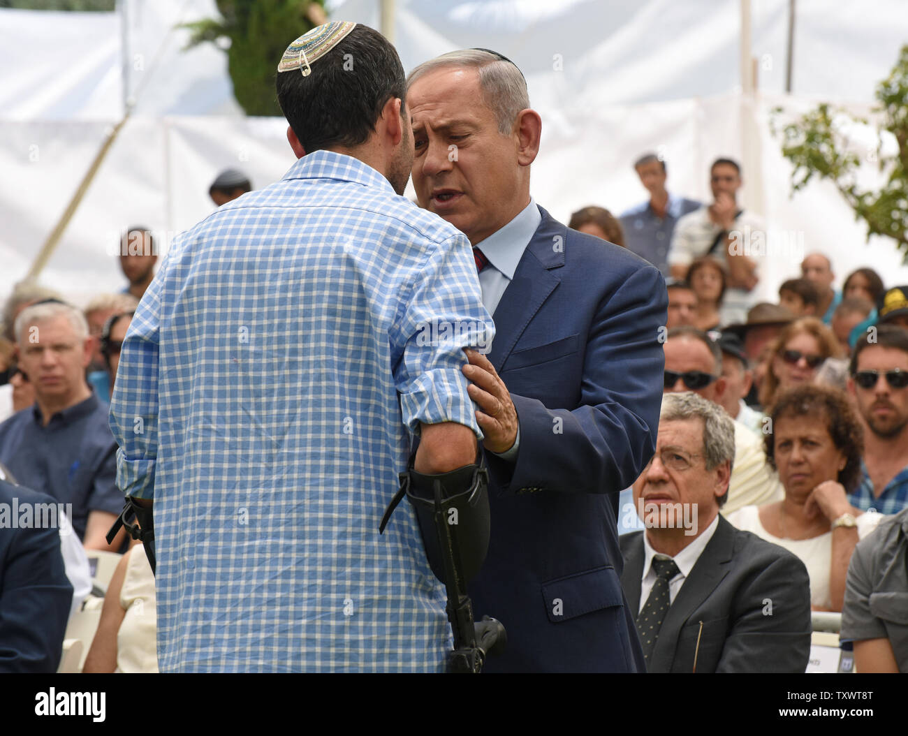 Israeli Prime Minister Benjamin Netanyahu greets a disabled soldier at ...
