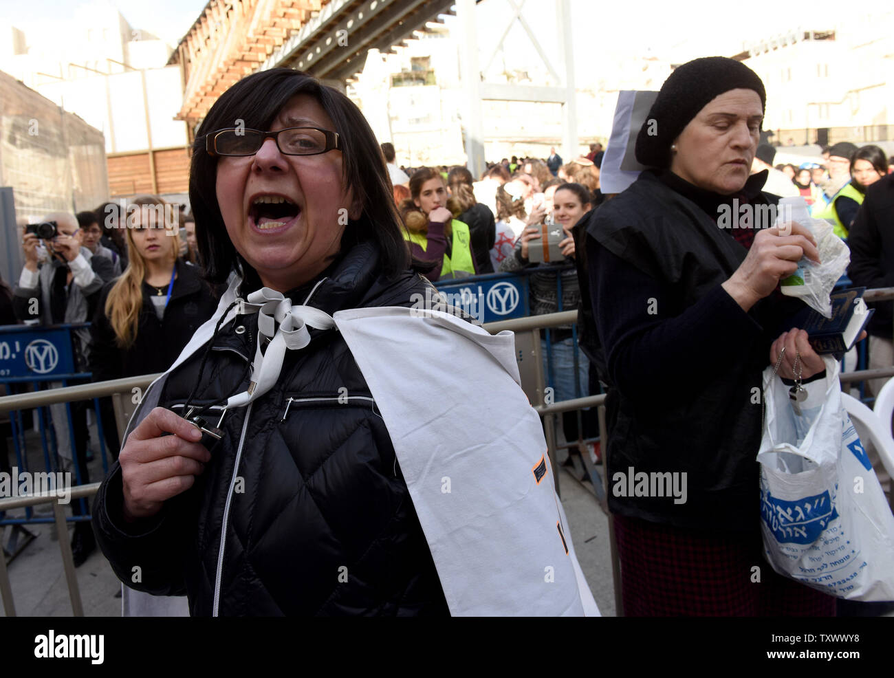 Ultra-Orthodox Jewish women shout at liberal Jewish women from the ...