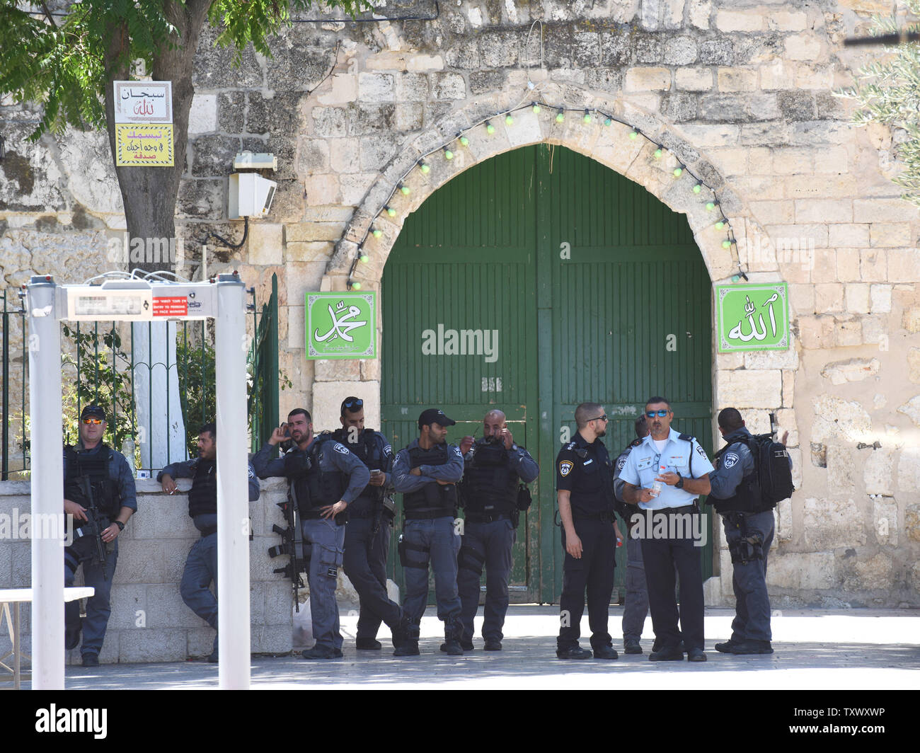 Israeli special forces stand beside a newly installed metal detector at ...