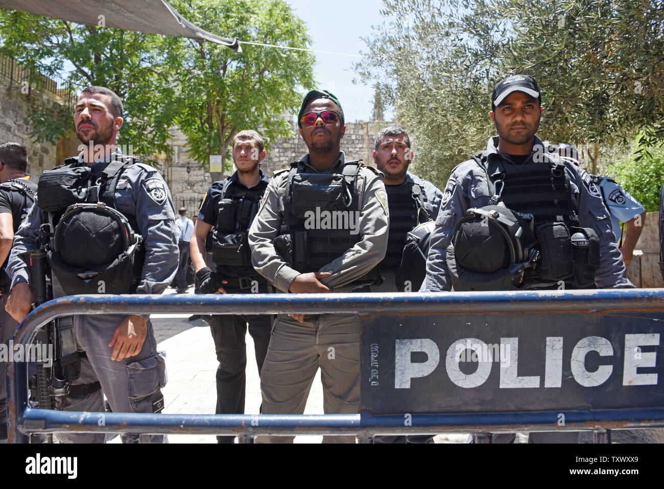Israeli security forces stand guard near an entrance to the Temple ...