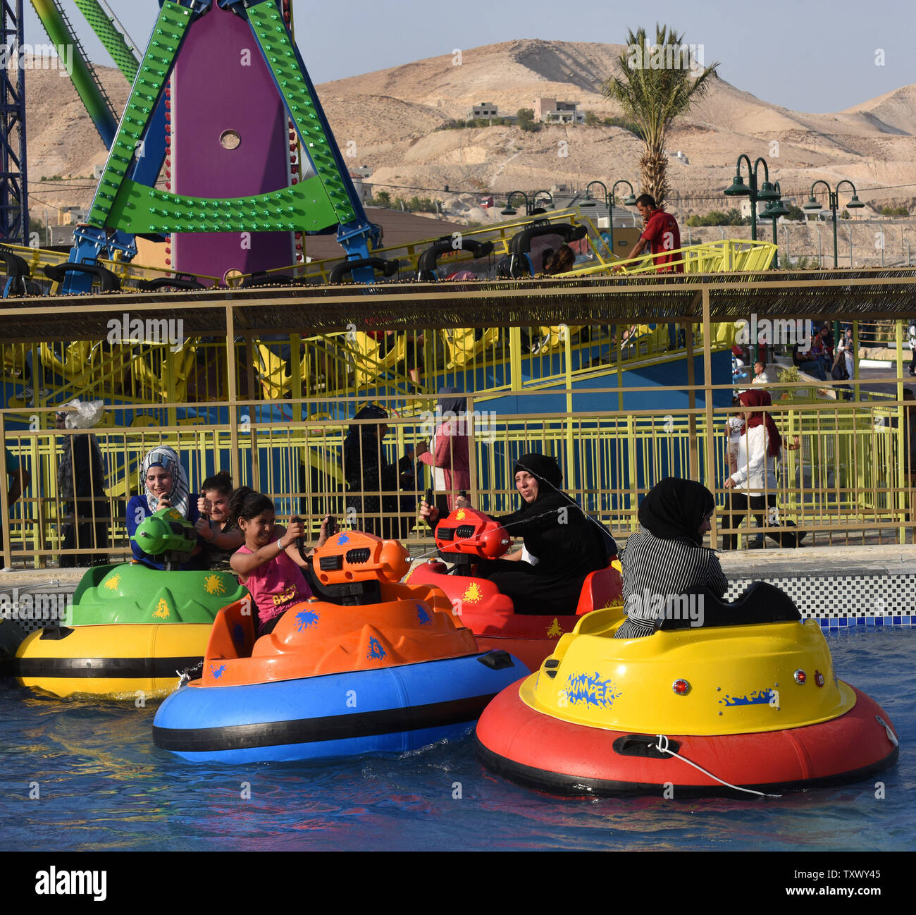 Palestinians celebrate the third day of the Muslim feast of Eid al-Adha ...