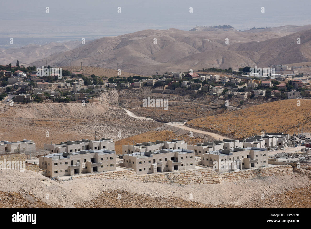 An overview of new Jewish housing being built in Kfar Adumim Settlement ...