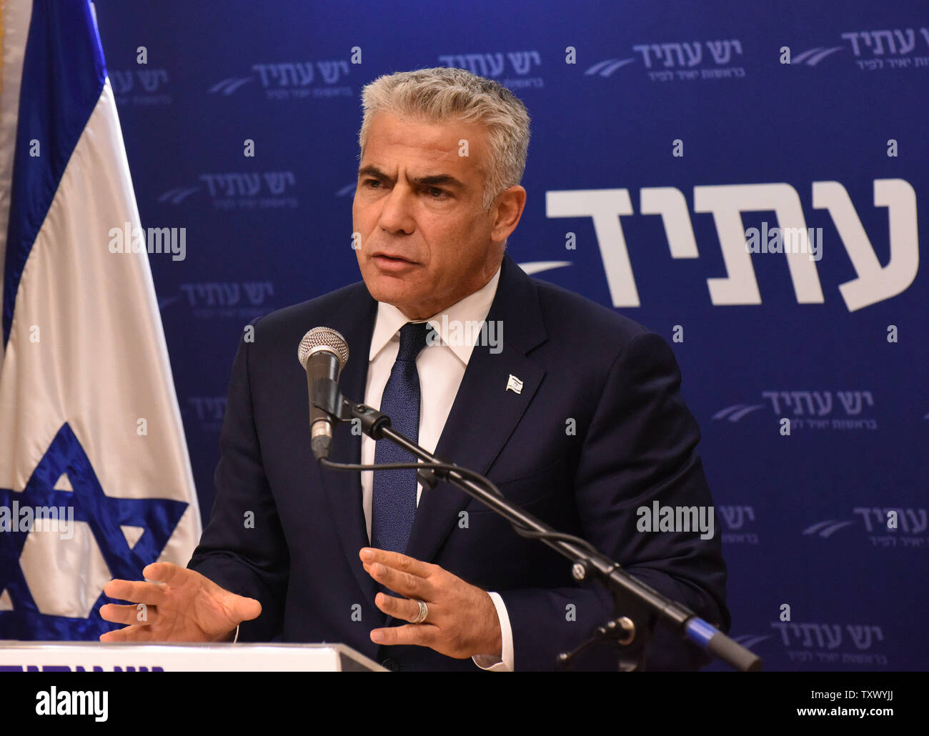Israeli politician Yair Lapid speaks during the Yesh Atid Party meeting ...