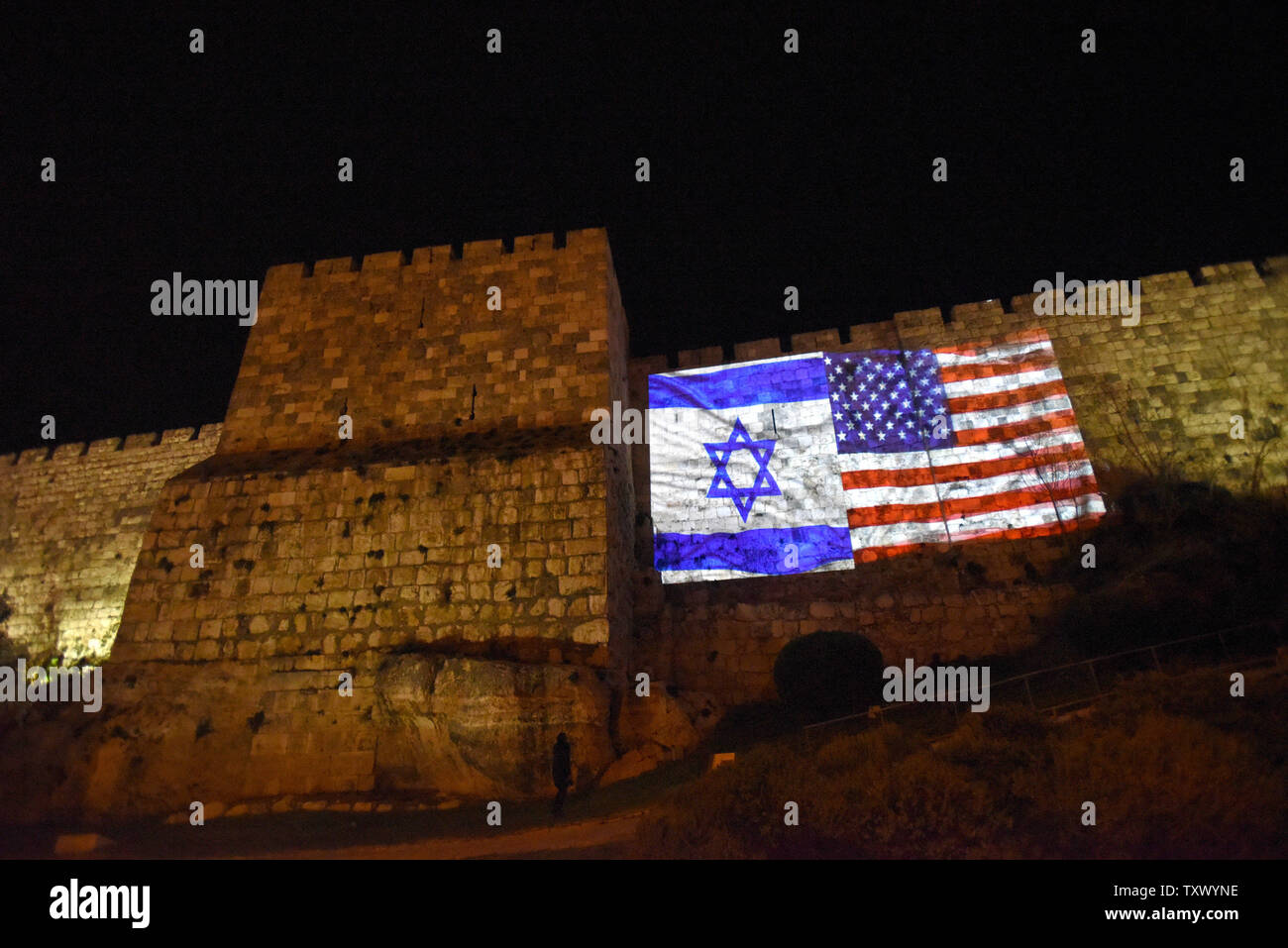 The American flag is projected beside the Israeli national flag on the ...