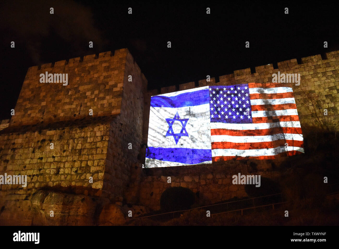 The American flag is projected beside the Israeli national flag on the ...