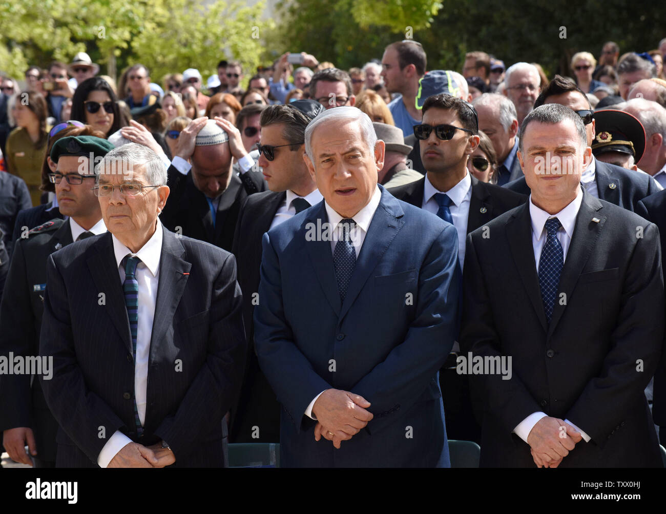 (L-R) Chairman of Yad Vashem, Avner Shalev, Israeli Prime Minister ...