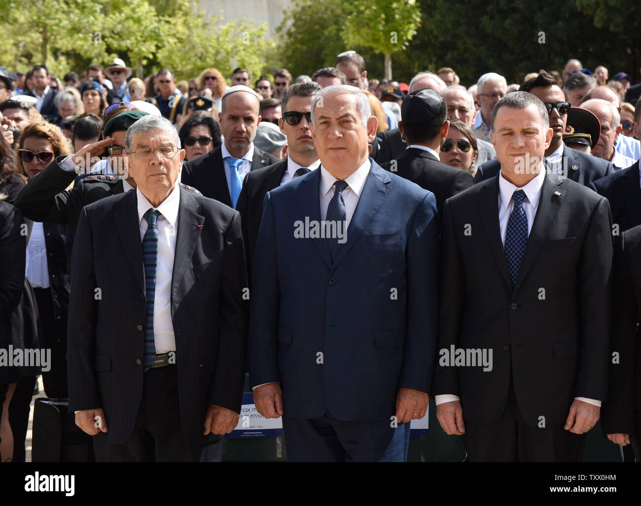 (L-R) Chairman of Yad Vashem, Avner Shalev, Israeli Prime Minister ...