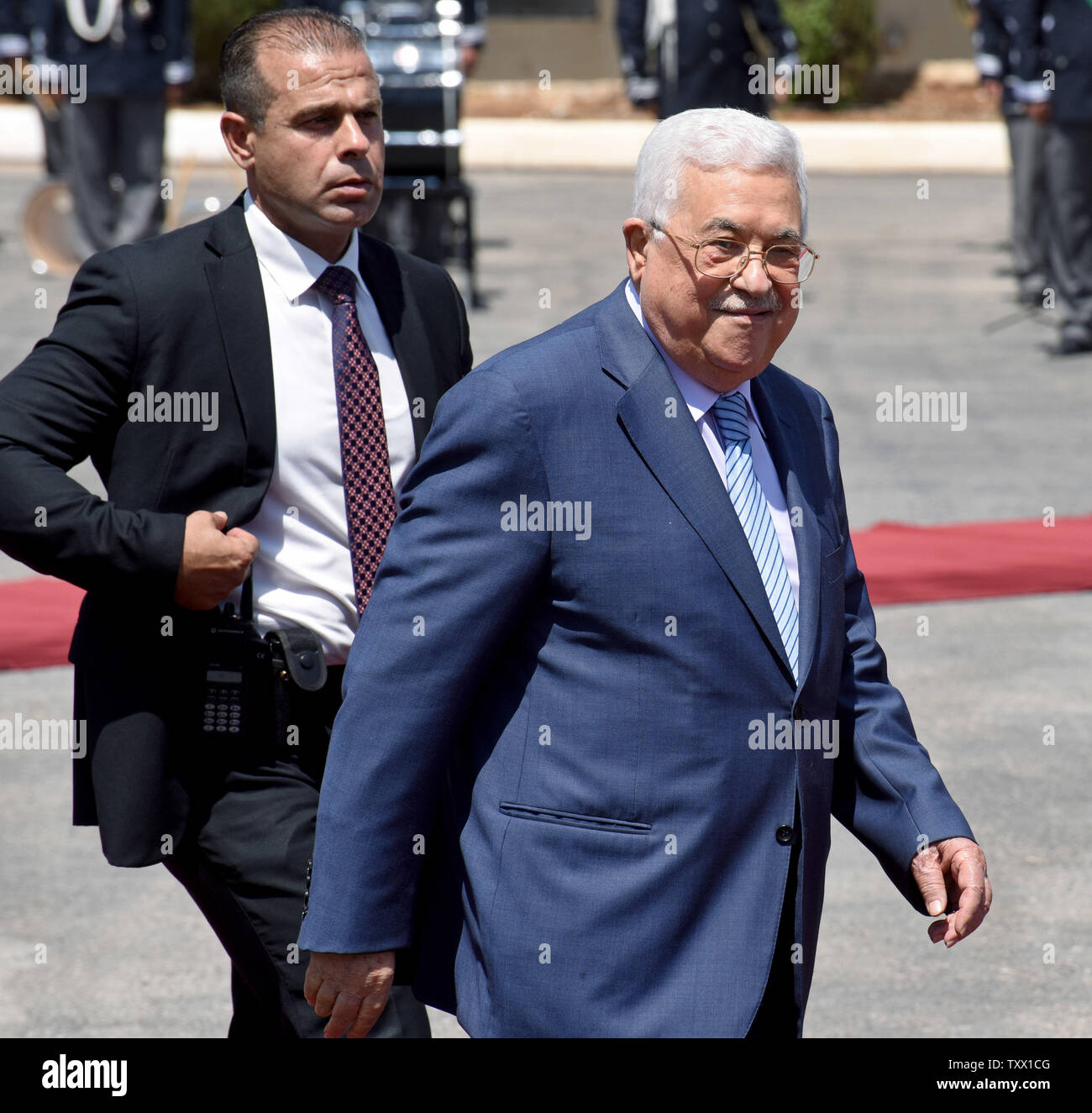 Palestinian President Mahmoud Abbas arrives to greet Chairman of the ...