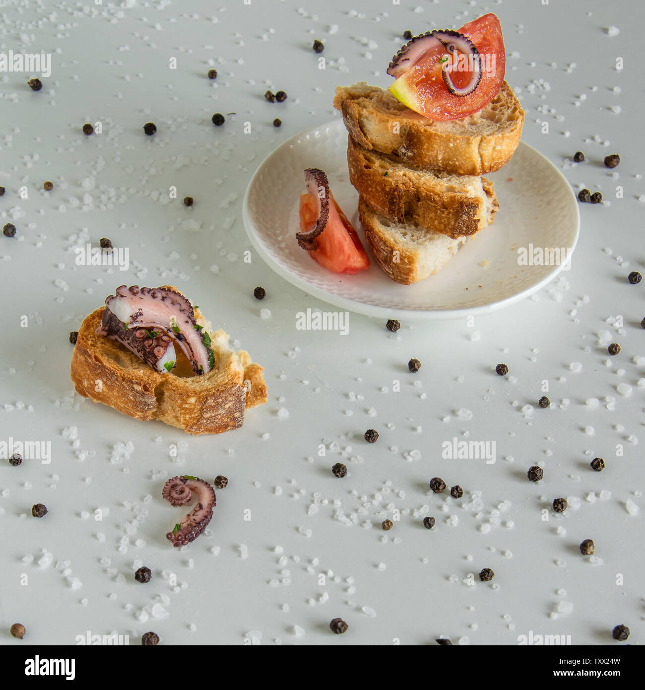 Top view of tasty Italian appetizers - bruschetta with raw tomatoes and ...