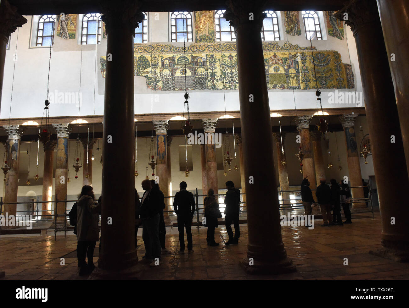 Tourists visit the newly restored Church of Nativity, where Christians ...