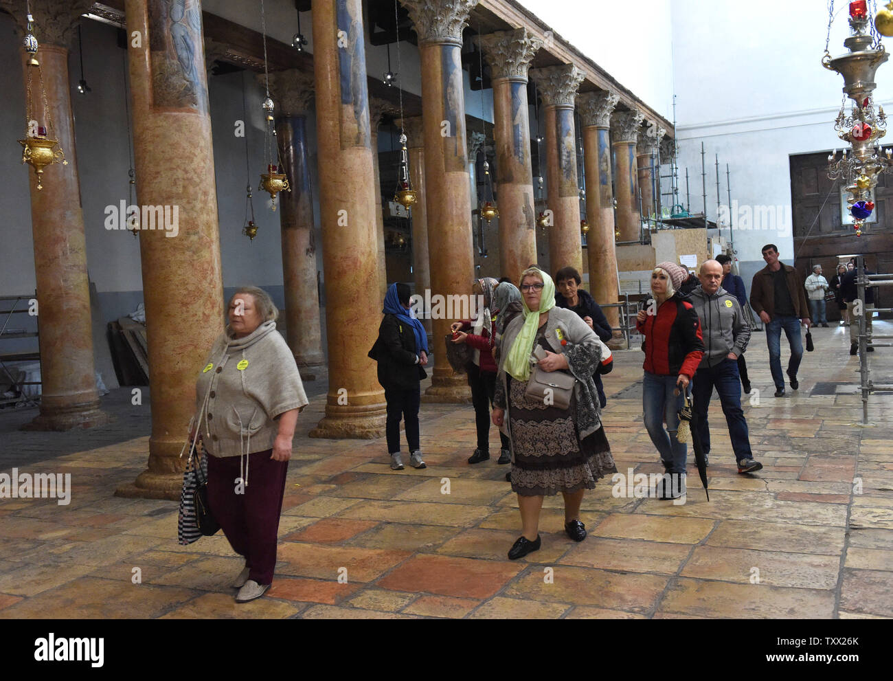 Tourists visit the newly restored Church of Nativity, where Christians ...