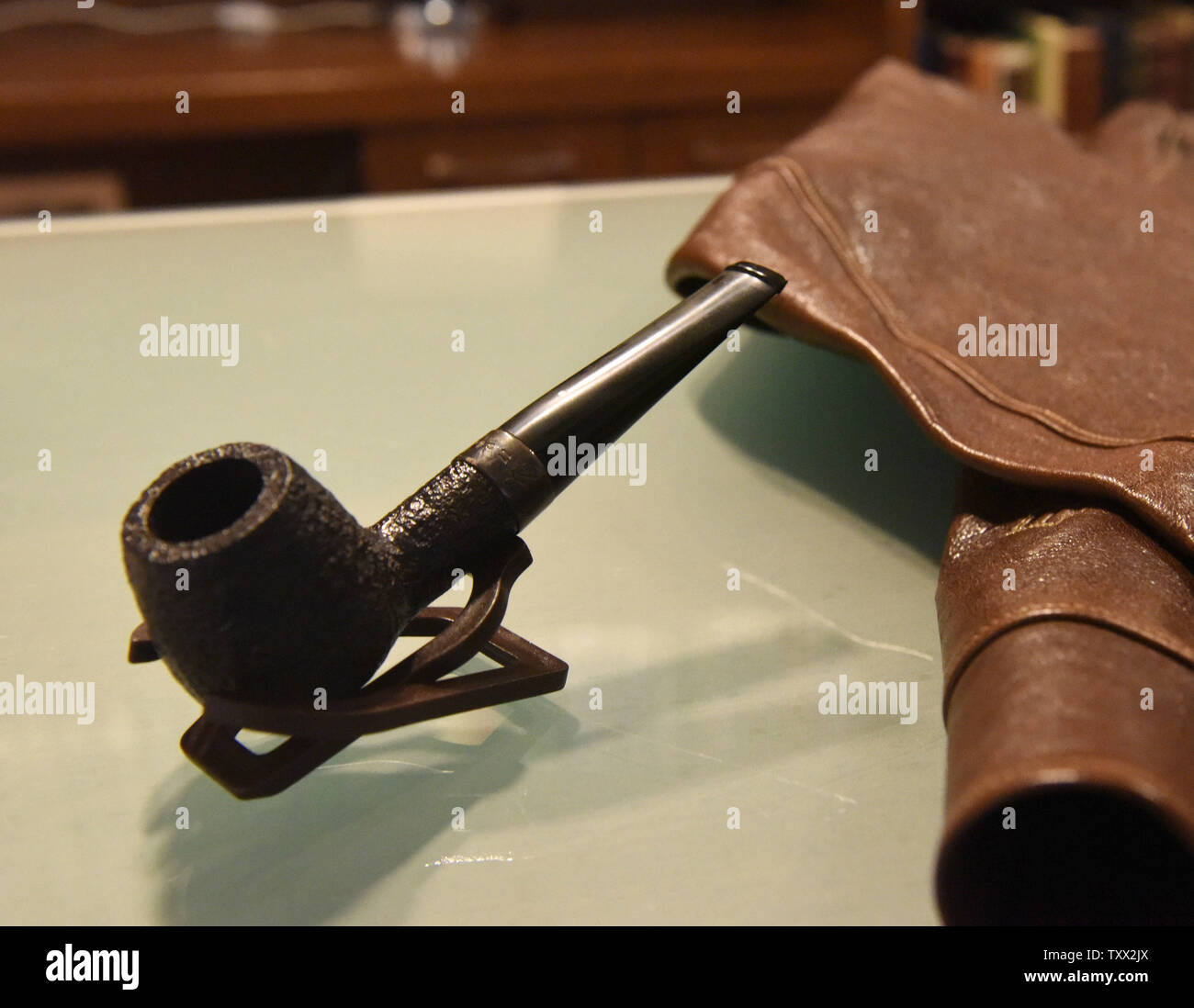 A close-up of one of Albert Einstein's iconic pipes is displayed with ...