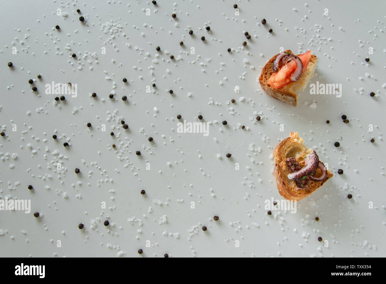 Top view of tasty Italian appetizers - bruschetta with raw tomatoes and ...