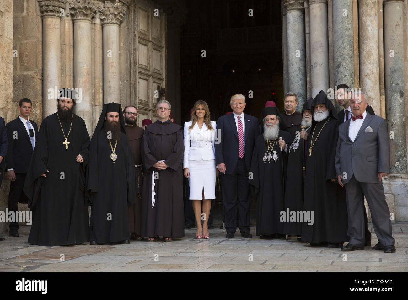US President Donald Trump and First Lady Melania Trump are greeted by ...