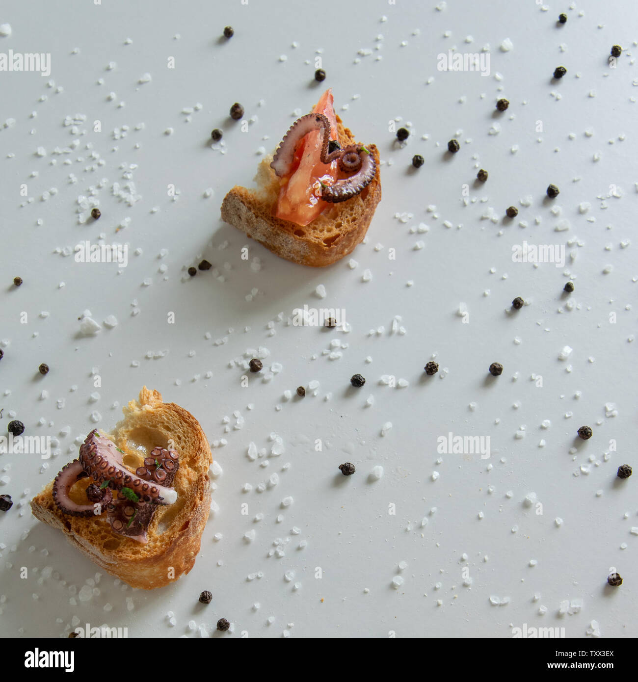 Top view of tasty Italian appetizers - bruschetta with raw tomatoes and ...