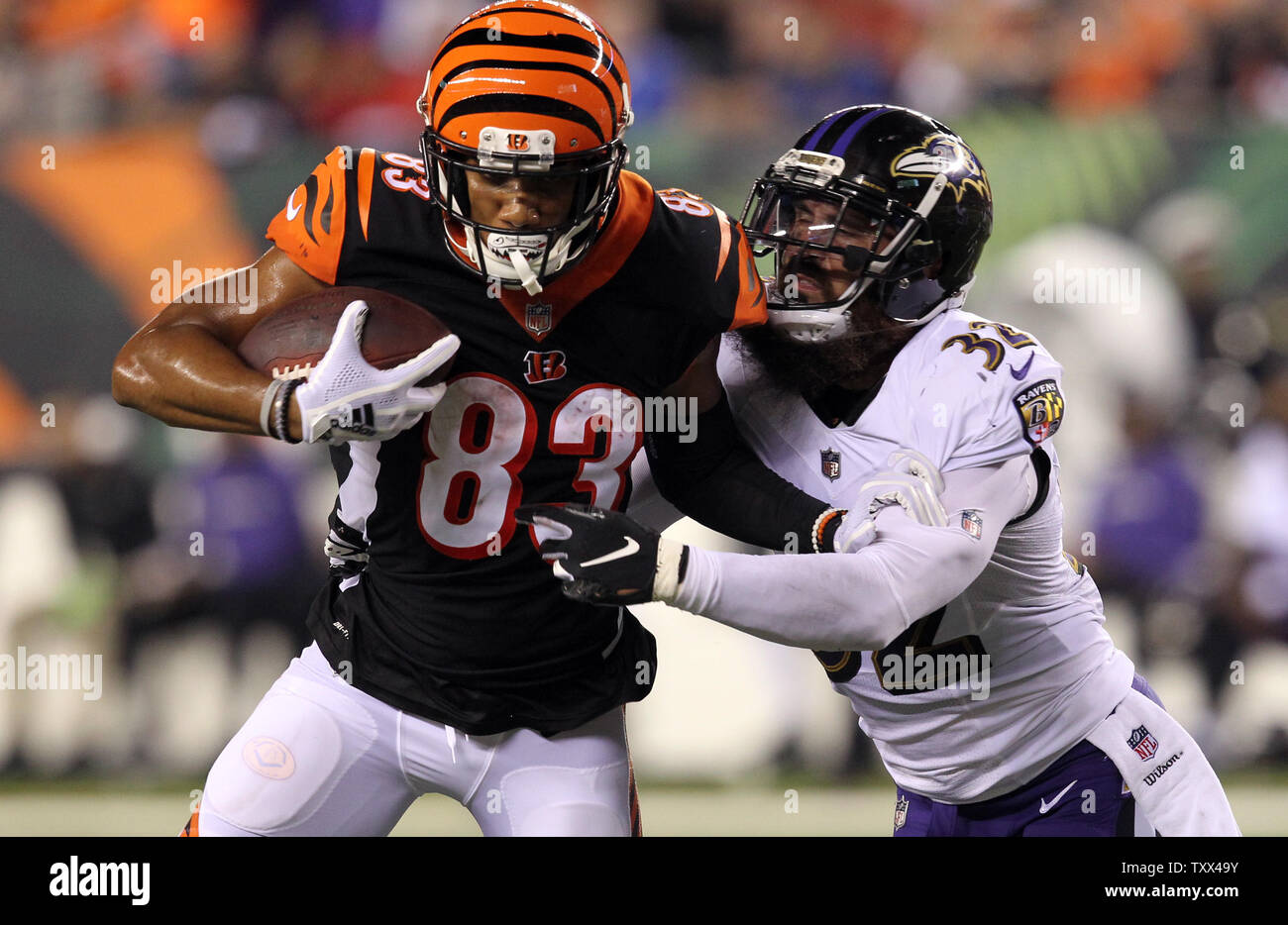 Cincinnati Bengals wide receiver Tyler Boyd (83) fights to break free ...