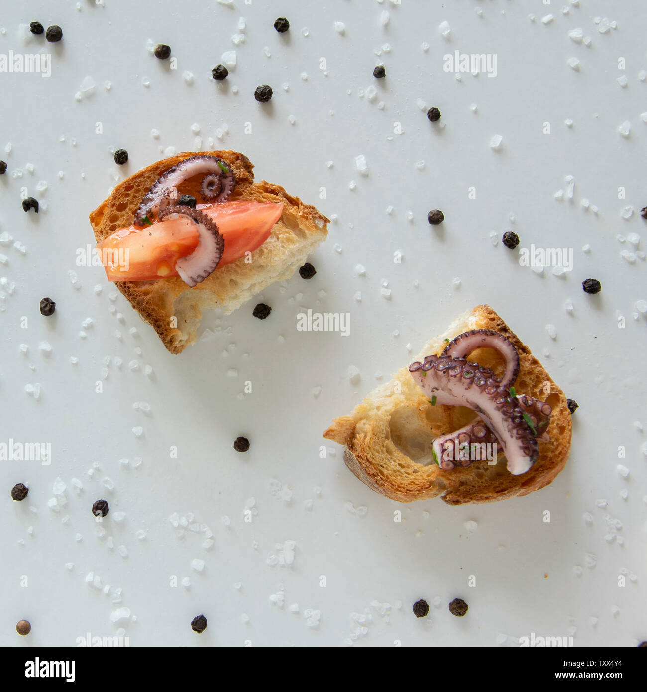 Top view of tasty Italian appetizers - bruschetta with raw tomatoes and ...
