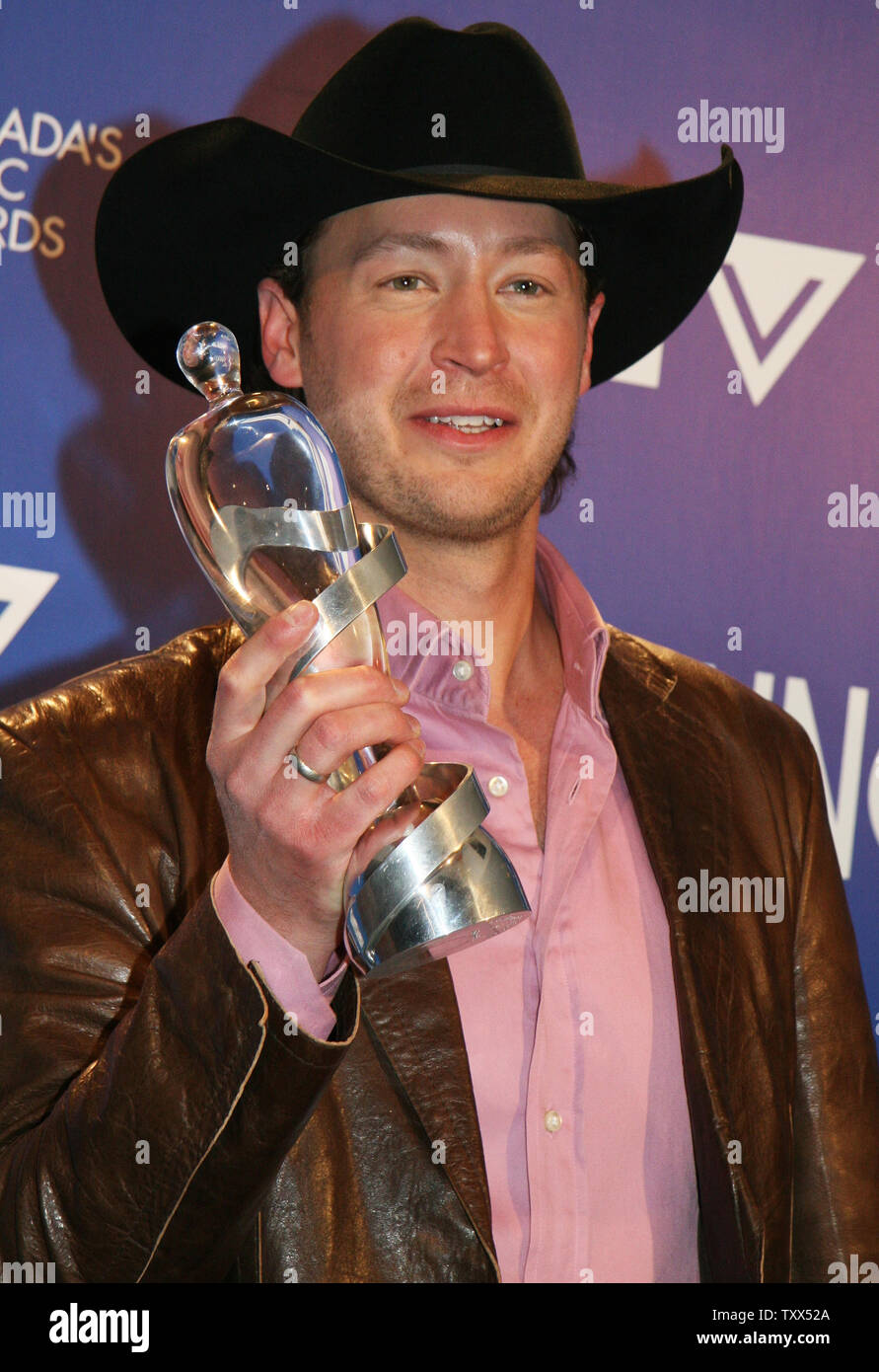 Paul Brandt celebrates backstage after winning the Country Recording of ...