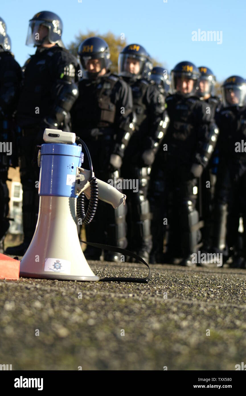 Police helmet handcuffs hi-res stock photography and images - Alamy