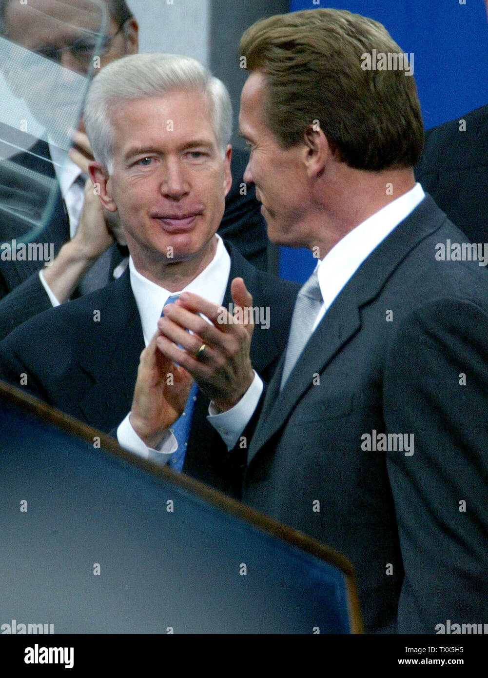 Gray Davis, left, at the swearing-in of Arnold Schwarzenegger, right ...
