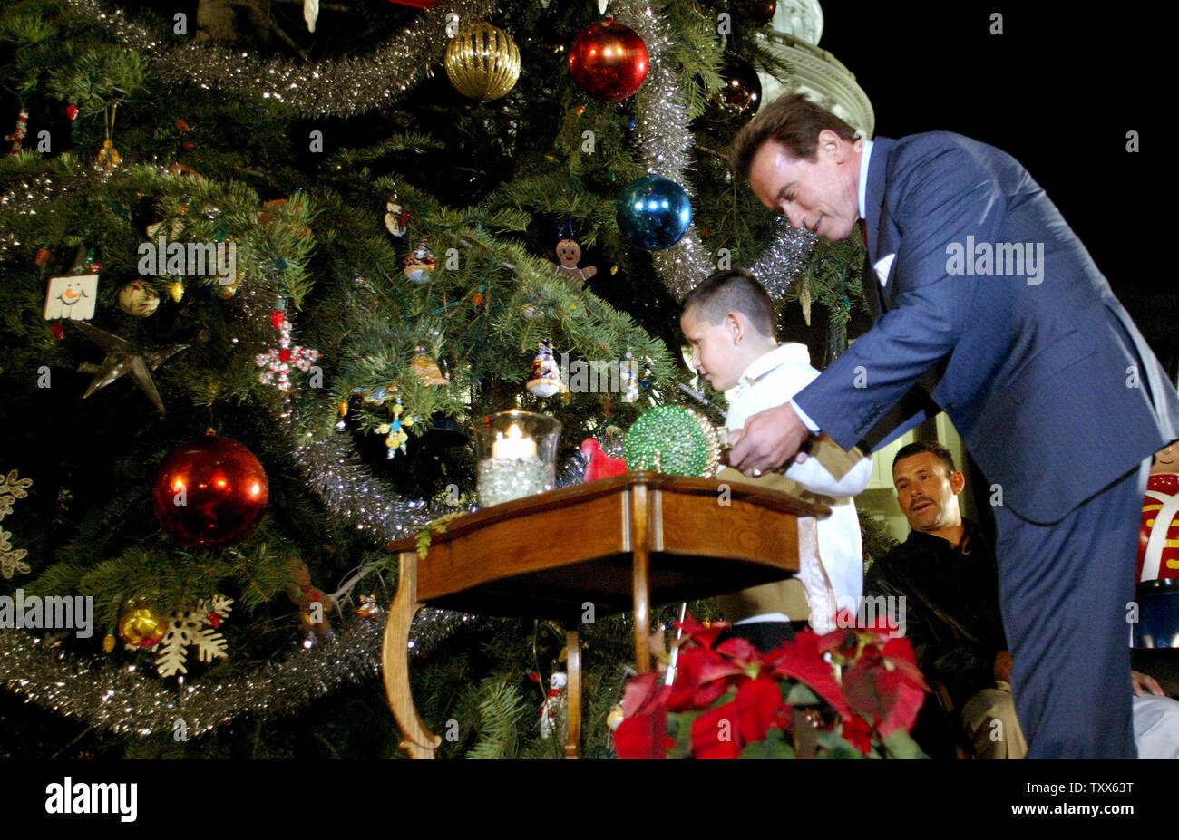 California Governor Arnold Schwarzenegger and nine year-old Jos Antonio ...
