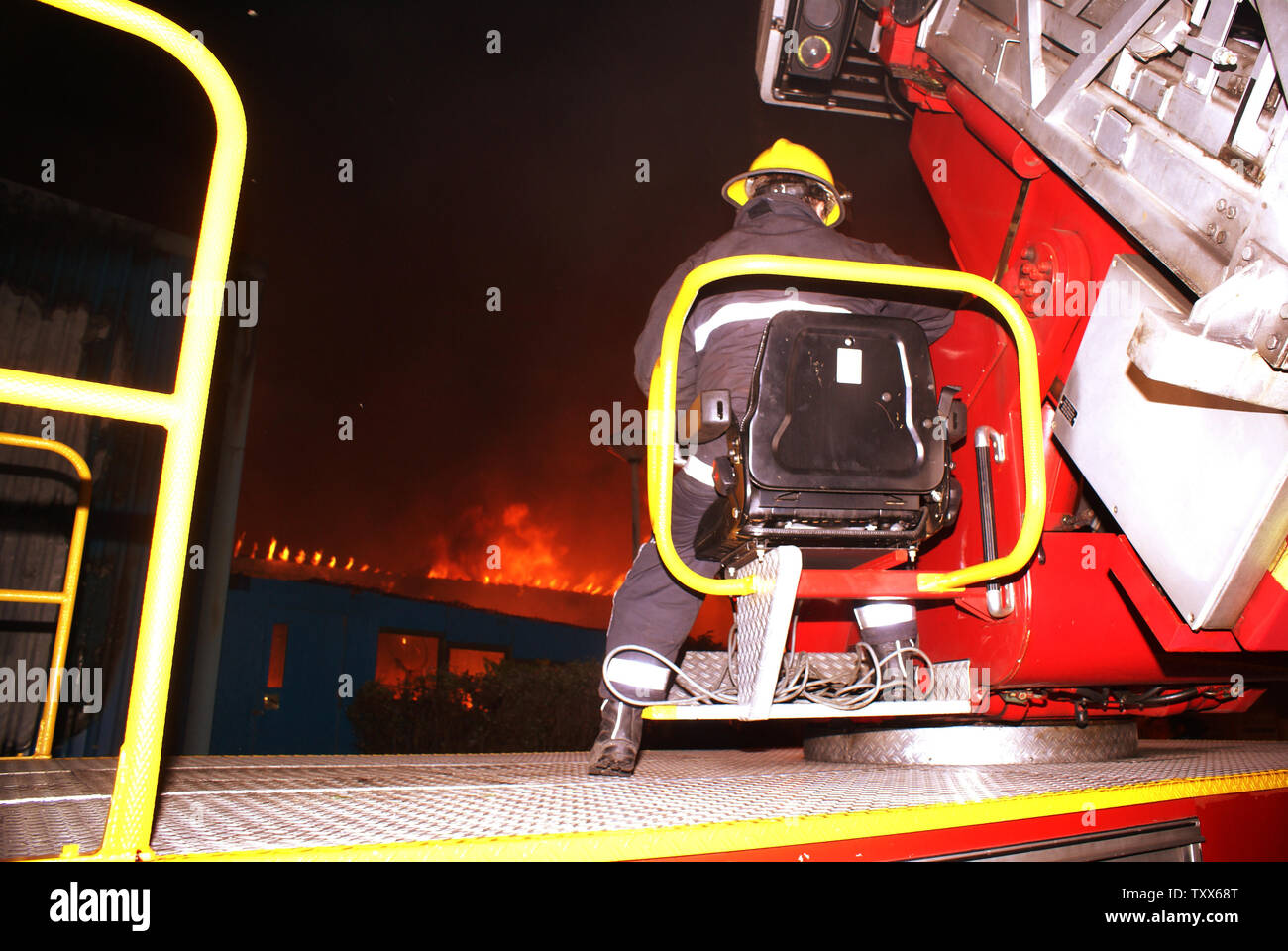 turn table ladder fire appliance at incident Stock Photo - Alamy