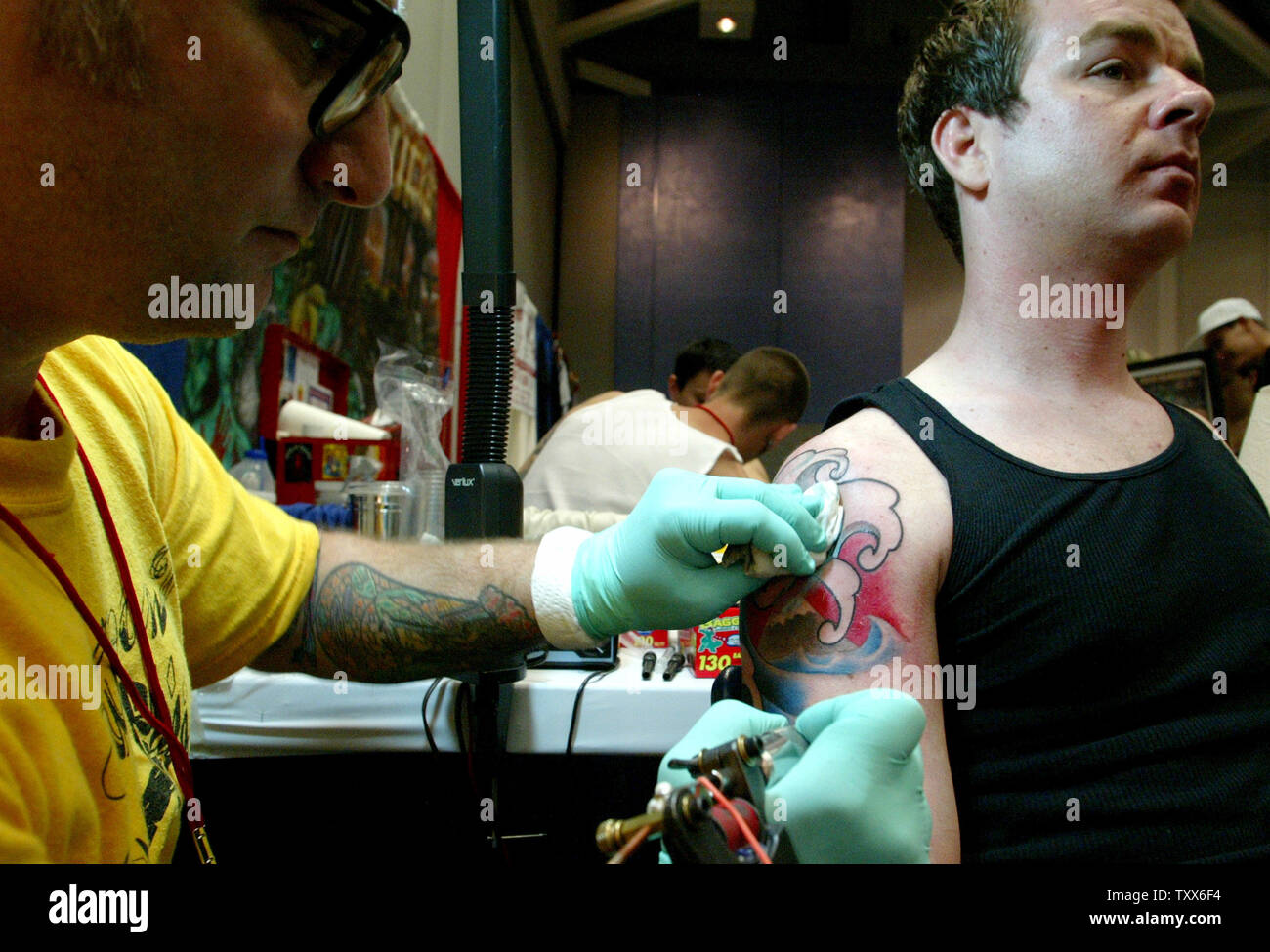 Kevin Pawloski from Sacramento, who is being tattoo for the first time ...