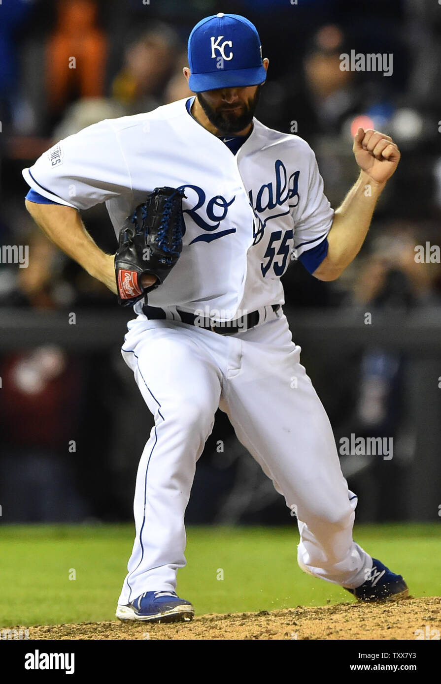 Kansas City Royals reliever Tim Holland celebrates closing out the San ...
