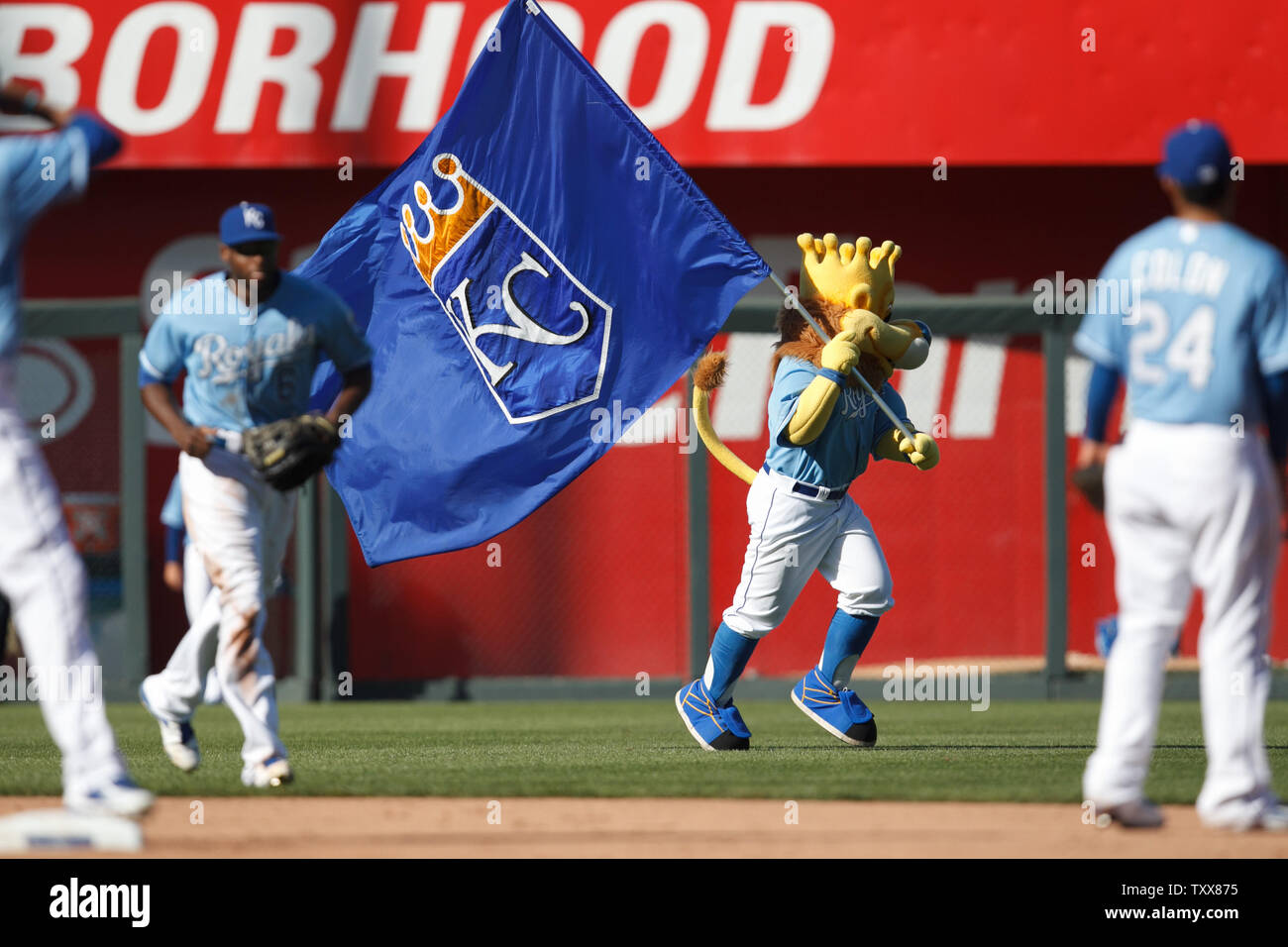 Kansas City Royals mascot Sluggerrr celebrates after defeating the ...