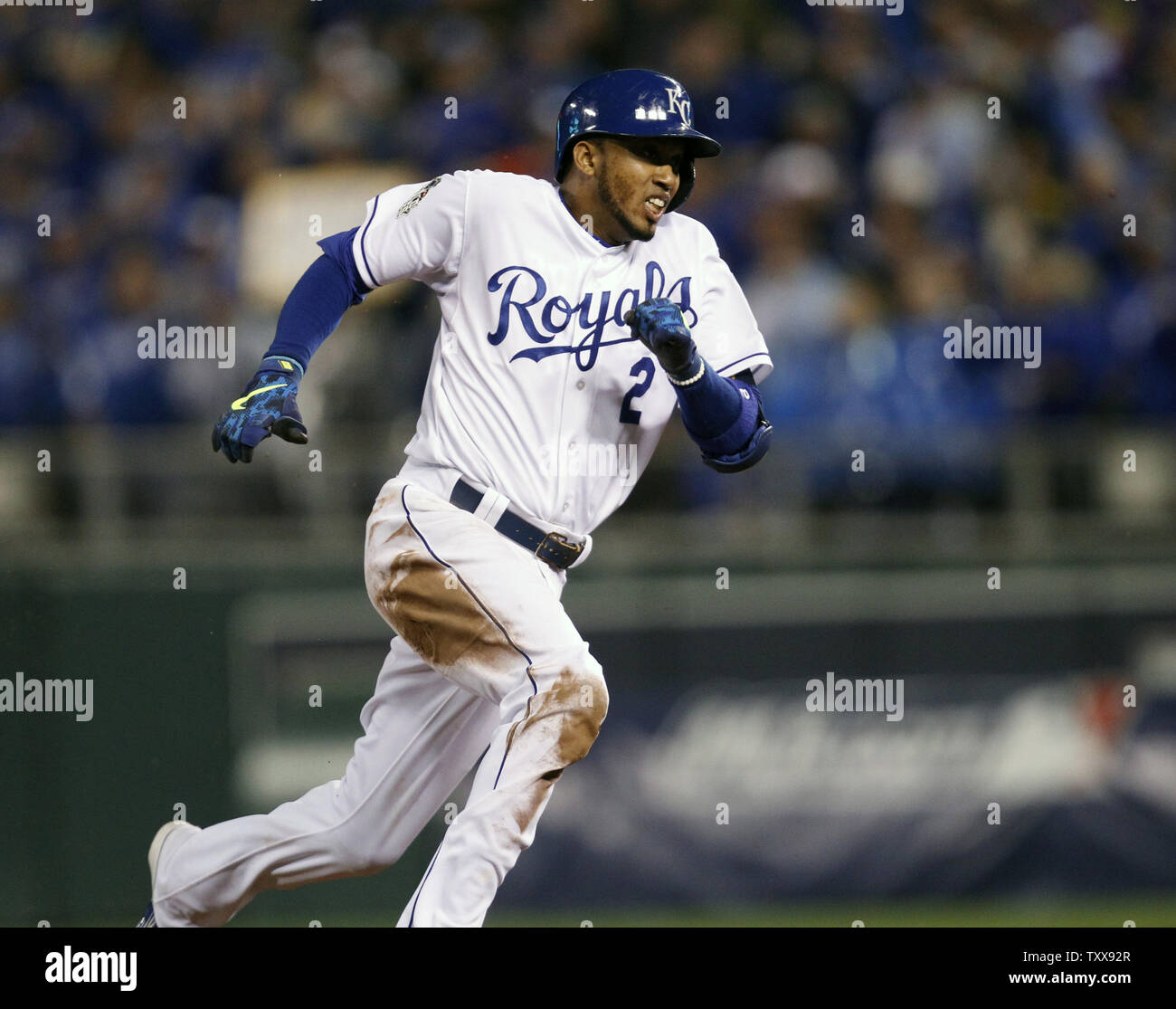 Kansas City Royals Alcides Escobar legs out an RBI triple off New York ...
