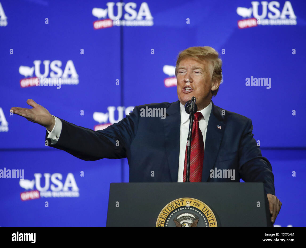 U.S. President Donald J. Trump addresses guests at the Foxconn Facility ...