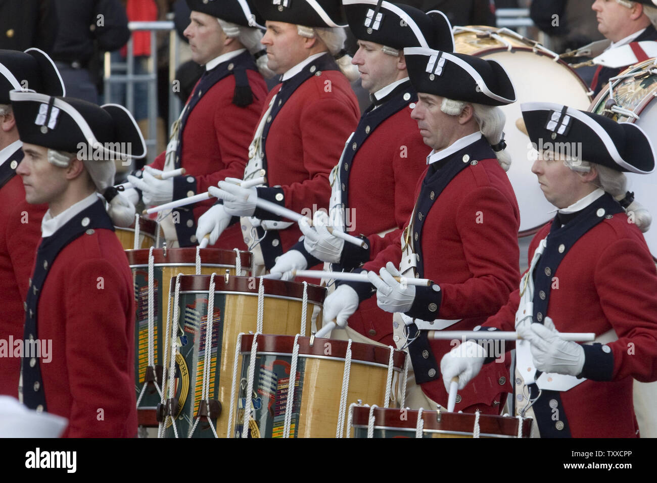 A marching band walks down Pennsylvania Avenue during the inaugural ...