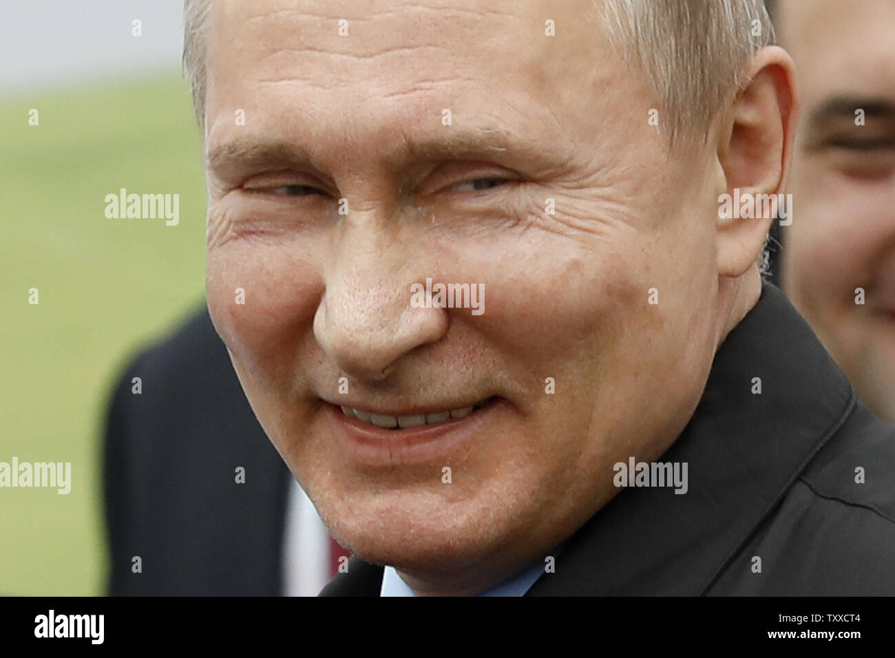 Russian president vladimir putin smiles hi-res stock photography and ...