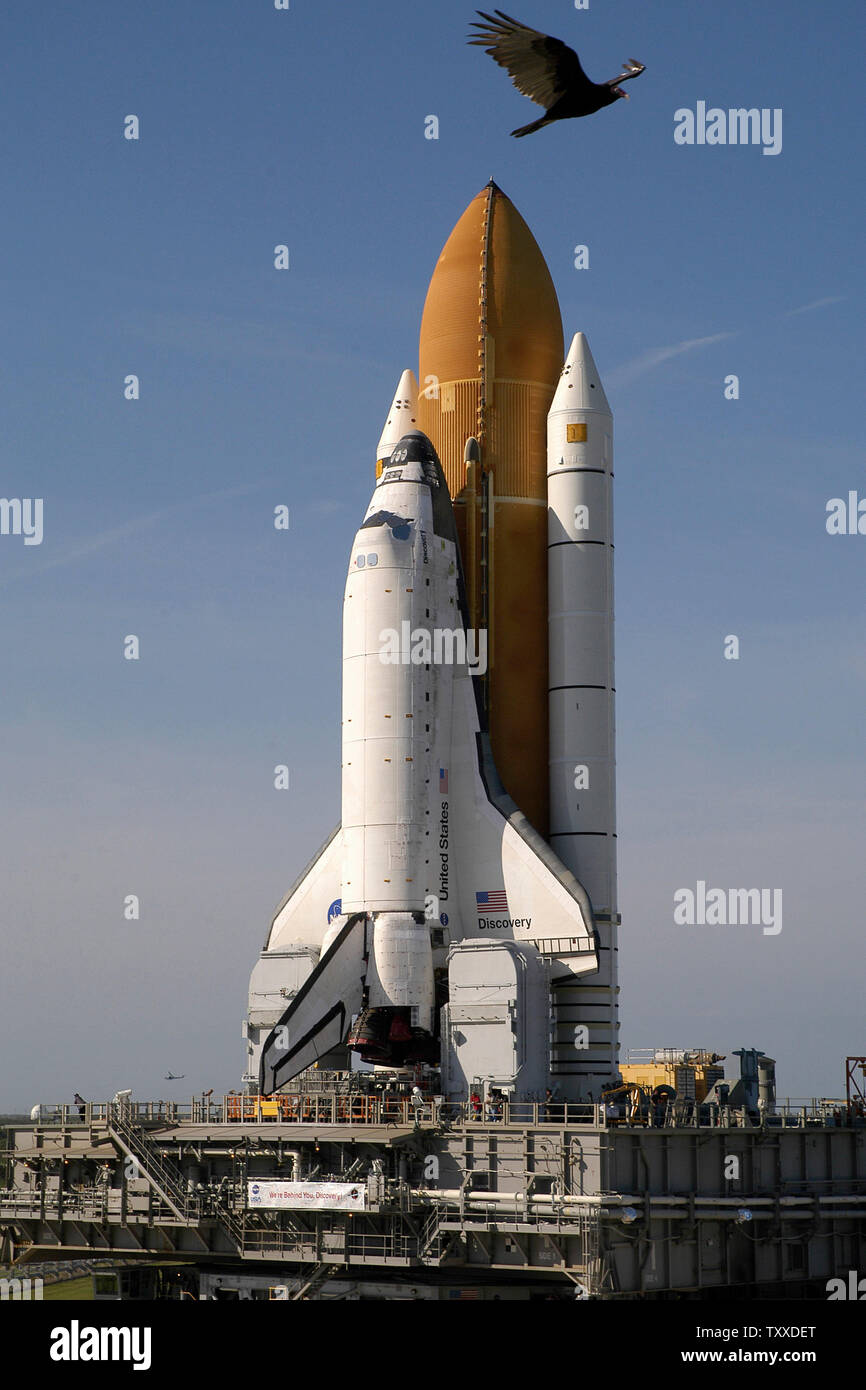 Space Shuttle Carries Vehicle