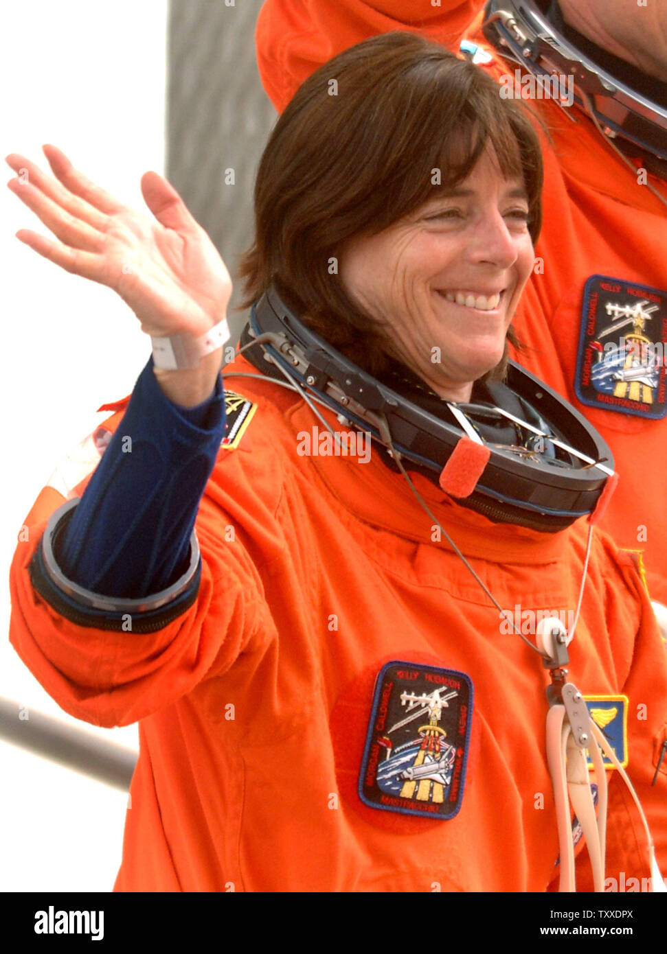 Mission Specialist Barbara Morgan makes her way to Launch Complex 39A ...