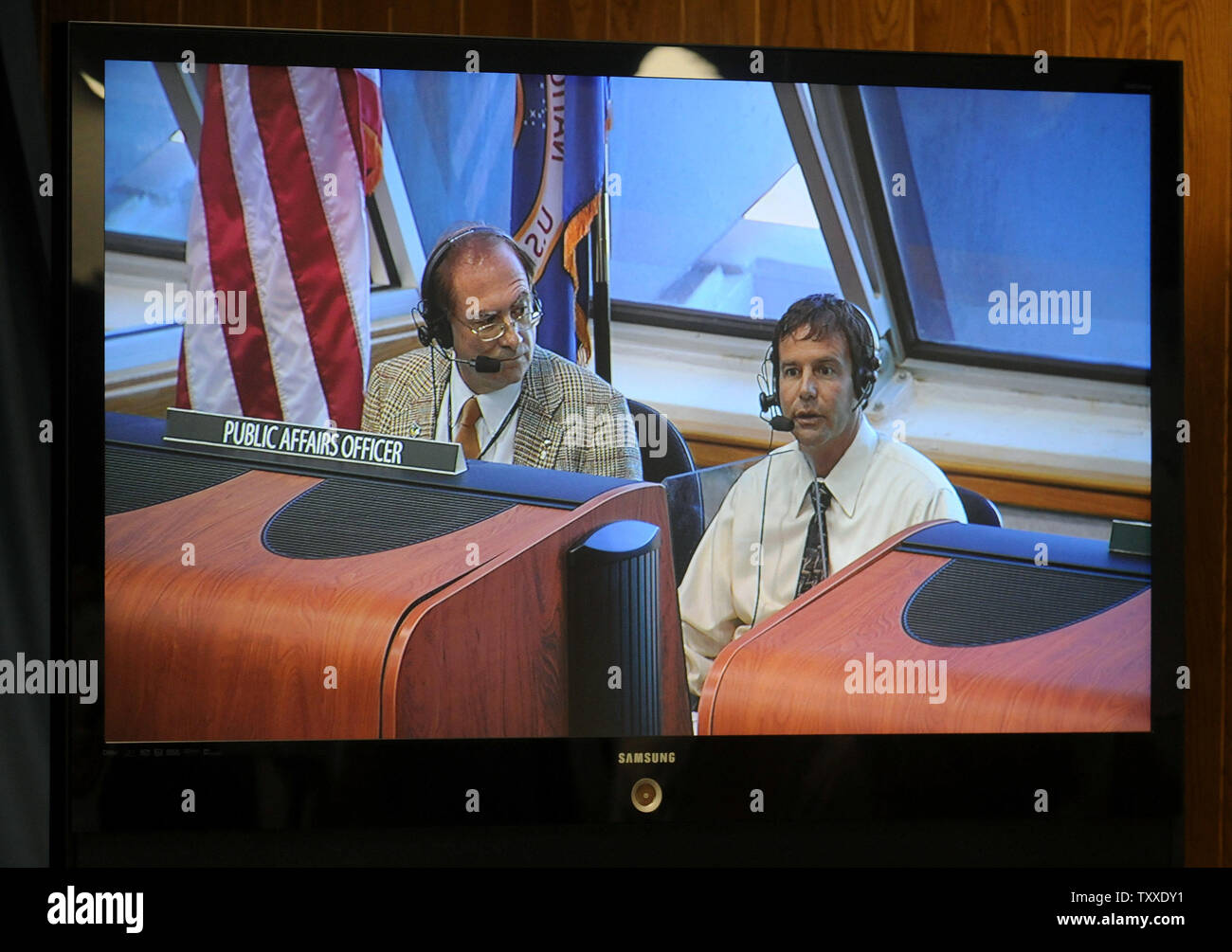 NASA's Public Affairs officer George Diller (L) and STS-122 Launch ...