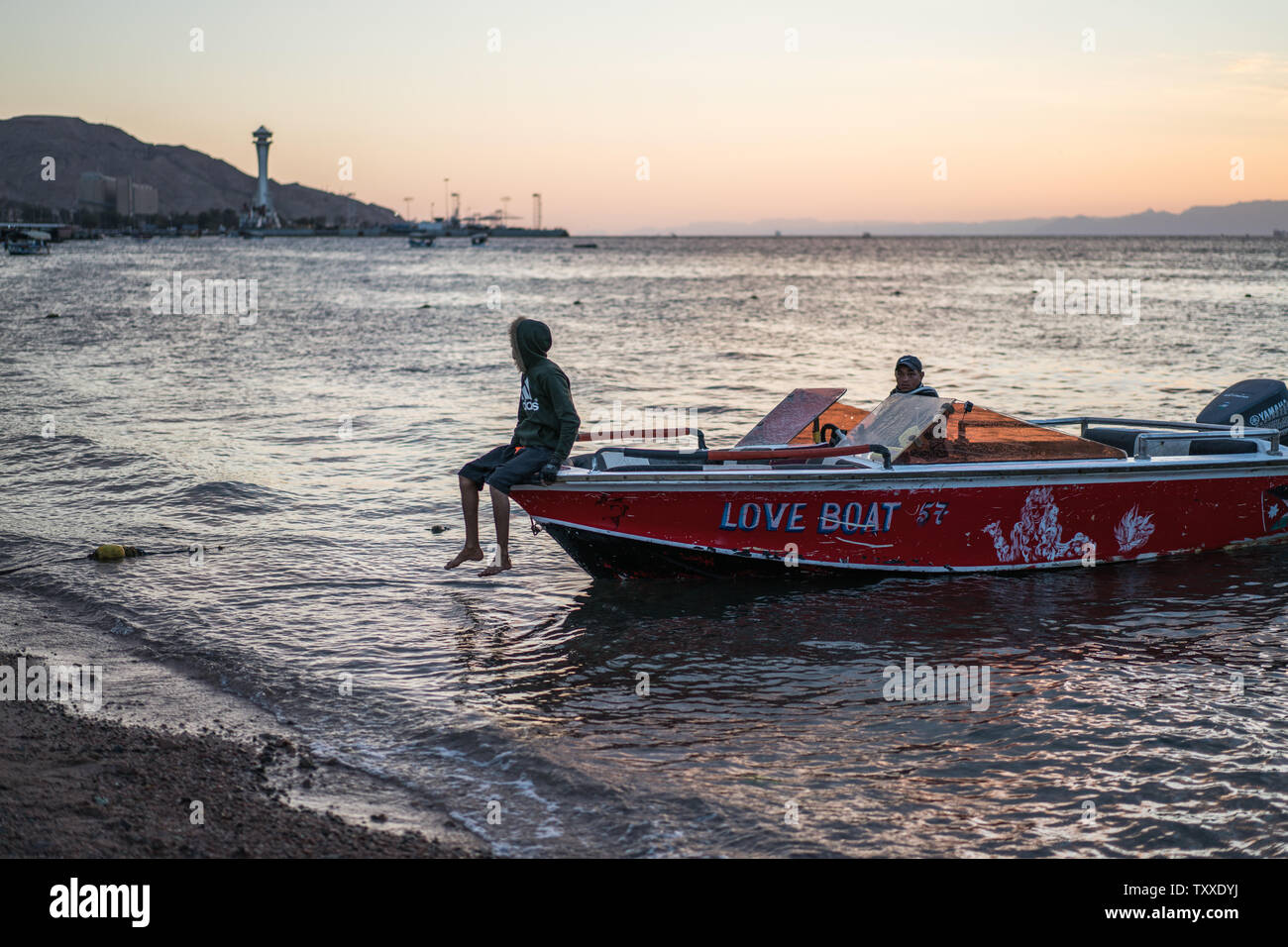 Local people on the beach, Aqaba, Jordan Stock Photo - Alamy